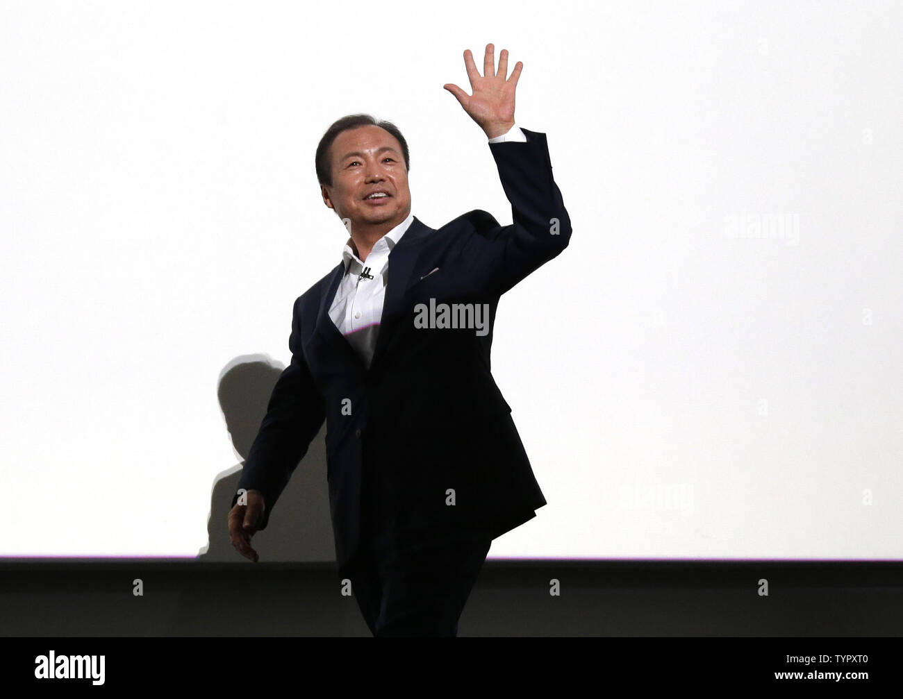 President and CEO of Samsung Electronics JK Shin steps on to the stage ...