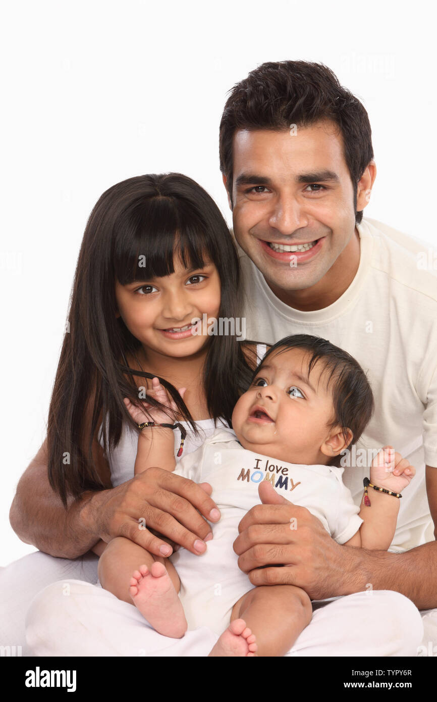 Portrait of an Indian man with his children Stock Photo - Alamy