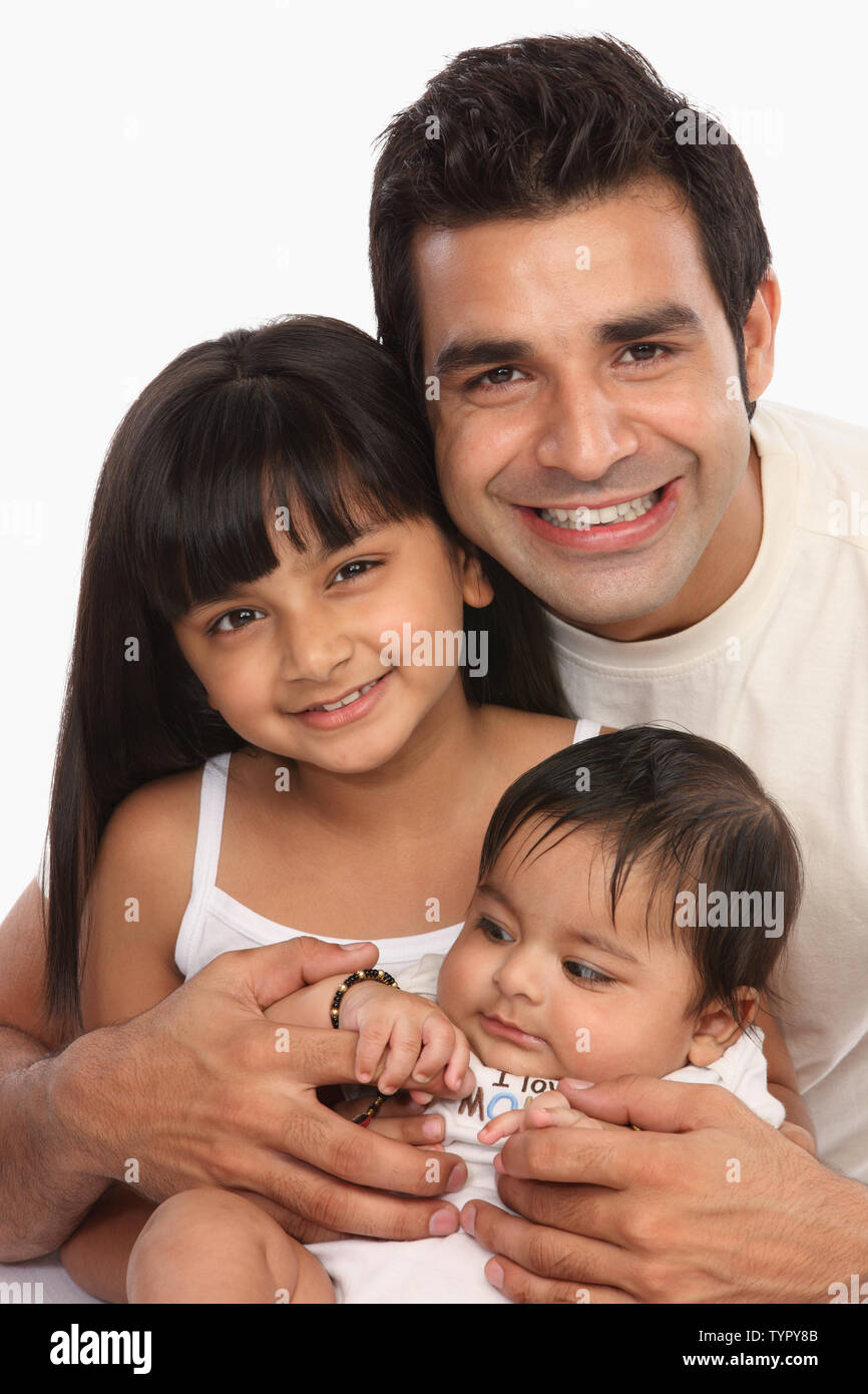 Portrait of a man with his children Stock Photo - Alamy