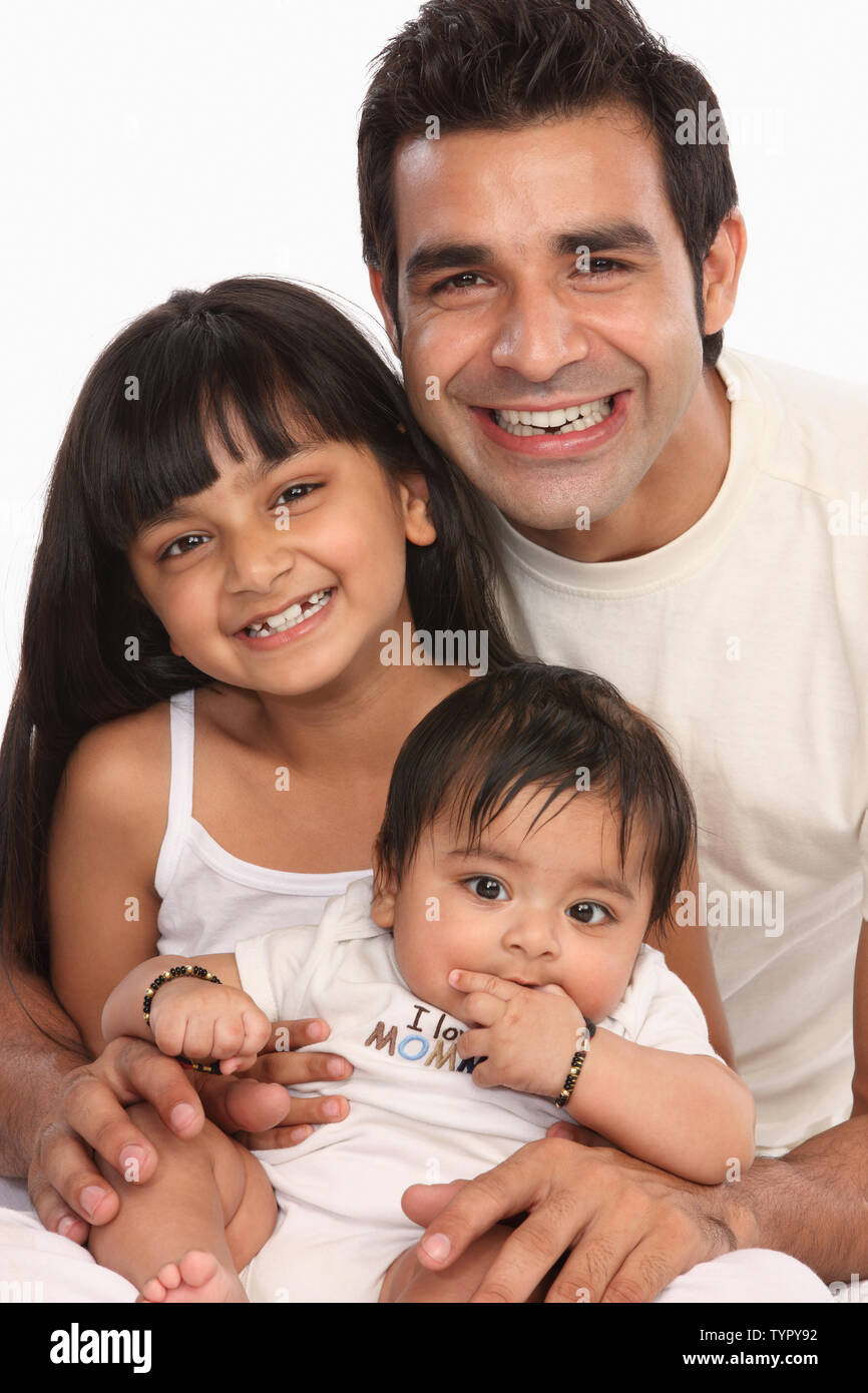 Portrait of a man with his children Stock Photo - Alamy
