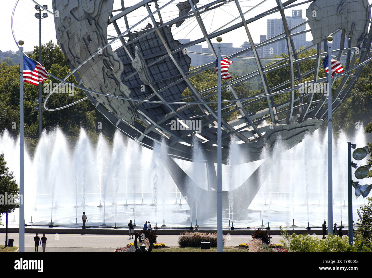 The fountains at the base of the Unisphere sculpture is seen as the US ...