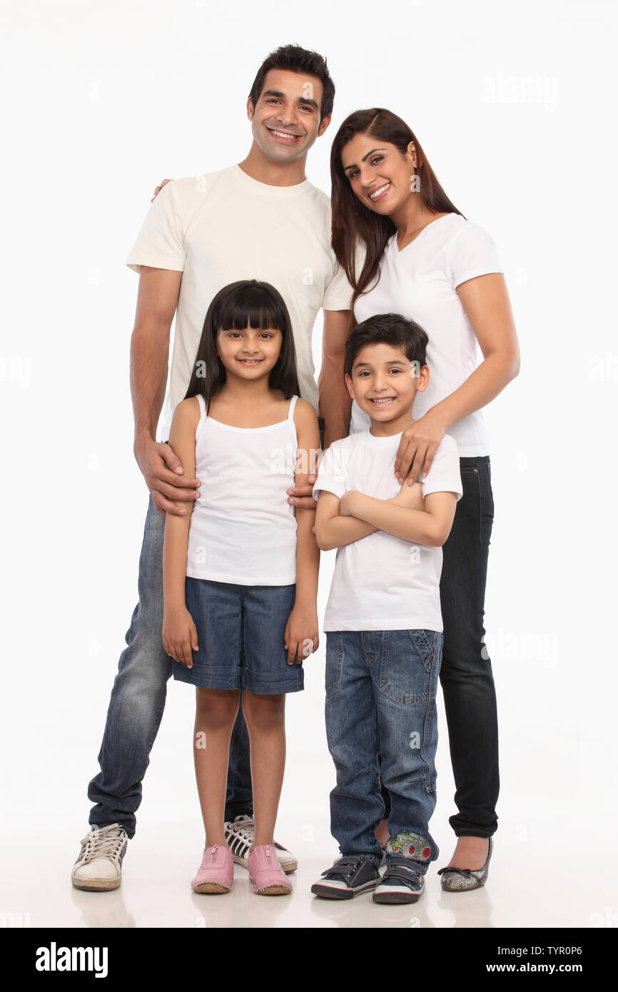 Portrait of a family standing together Stock Photo - Alamy