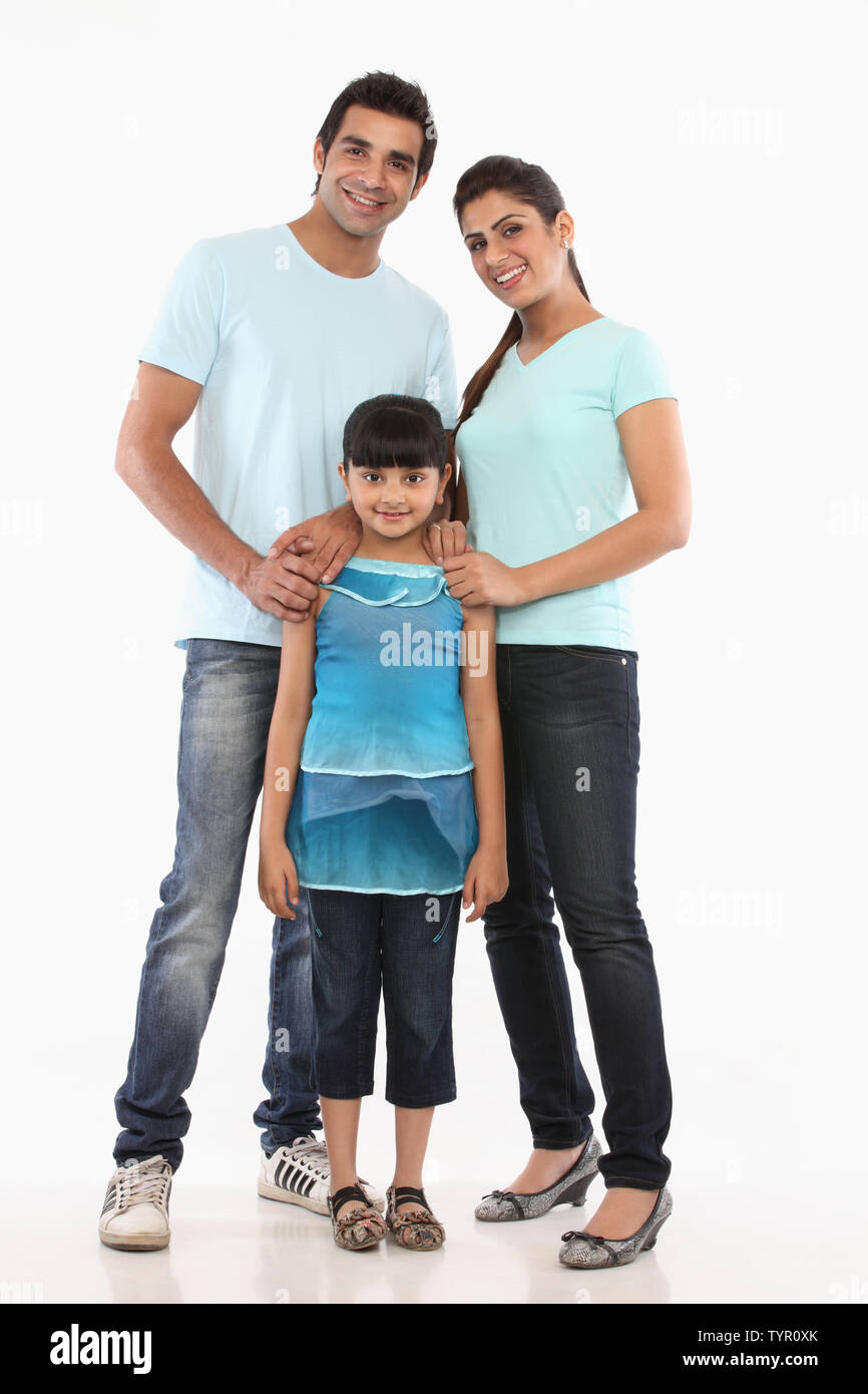 Portrait of a family standing Stock Photo - Alamy