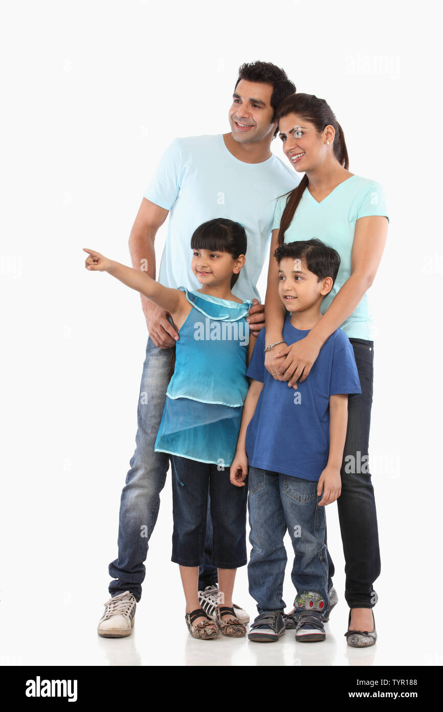 Family standing together Stock Photo - Alamy