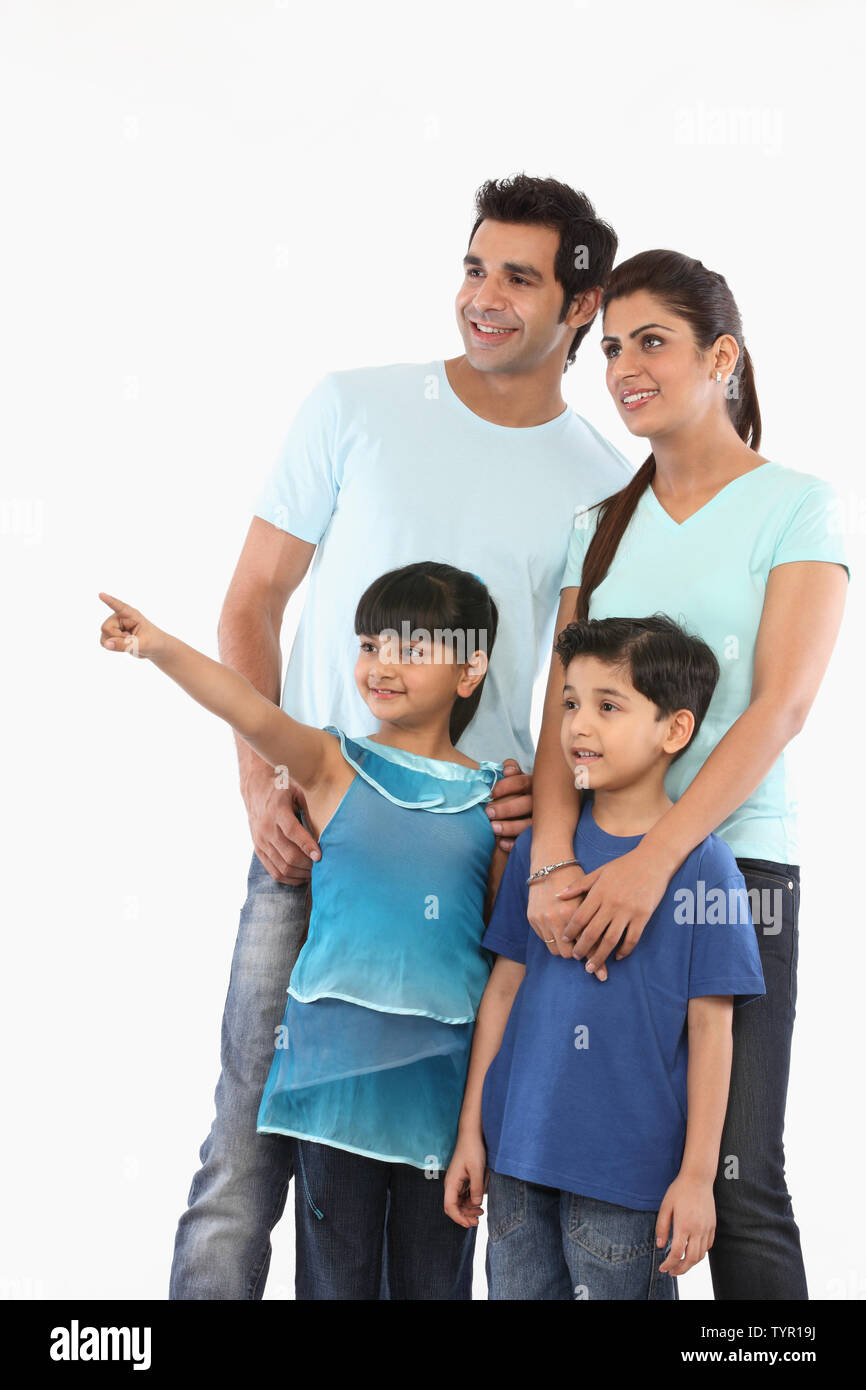 Family standing together Stock Photo - Alamy