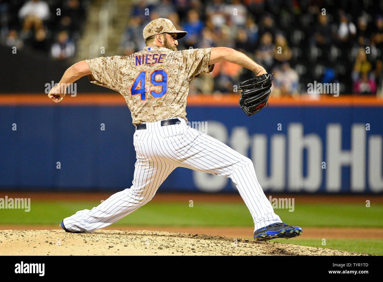 New York Mets starting pitcher Jonathon Niese (49) throws in the in the ...