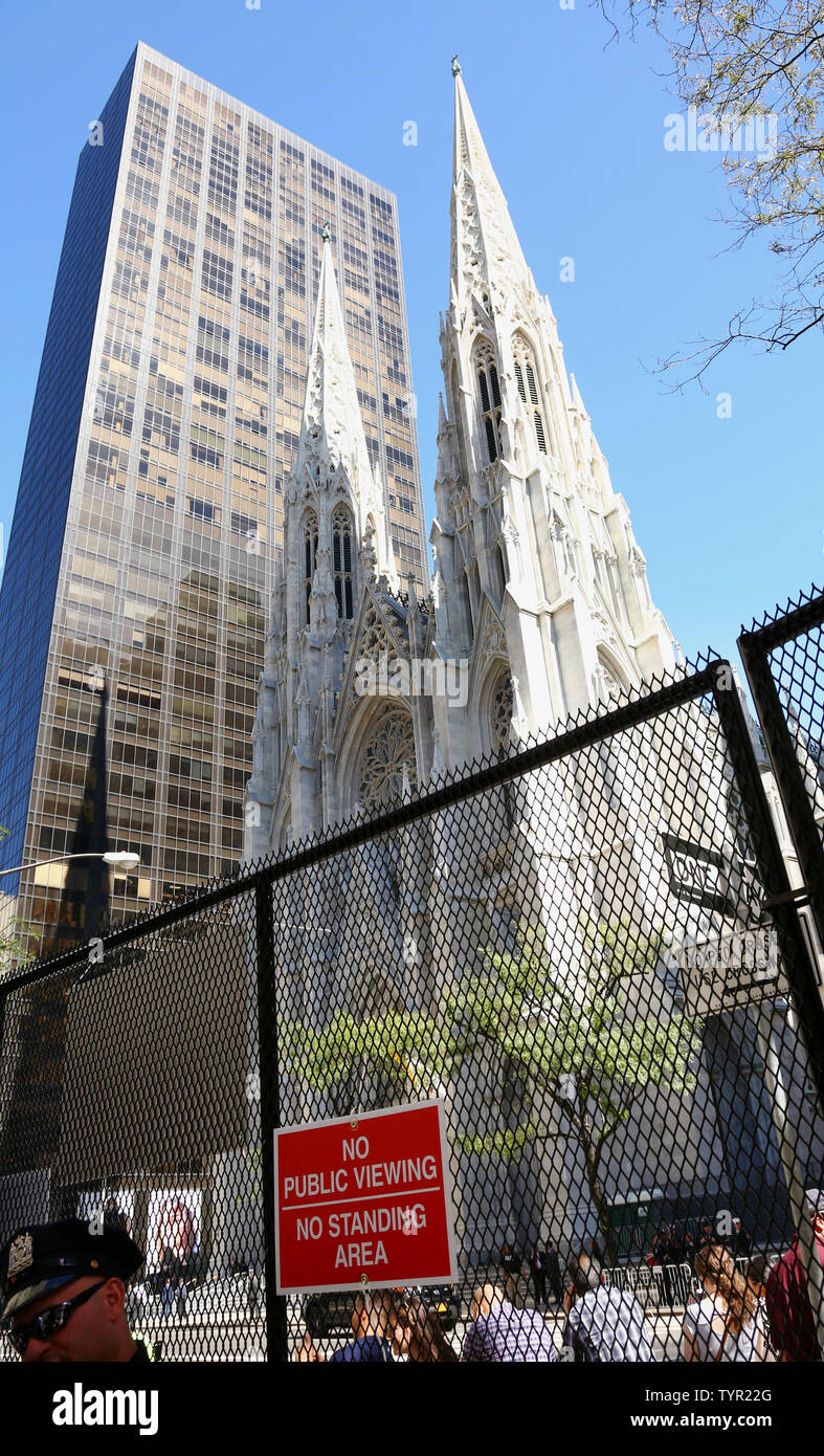 A tall security fence blocks Fifth Avenue across from St. Patrick's ...