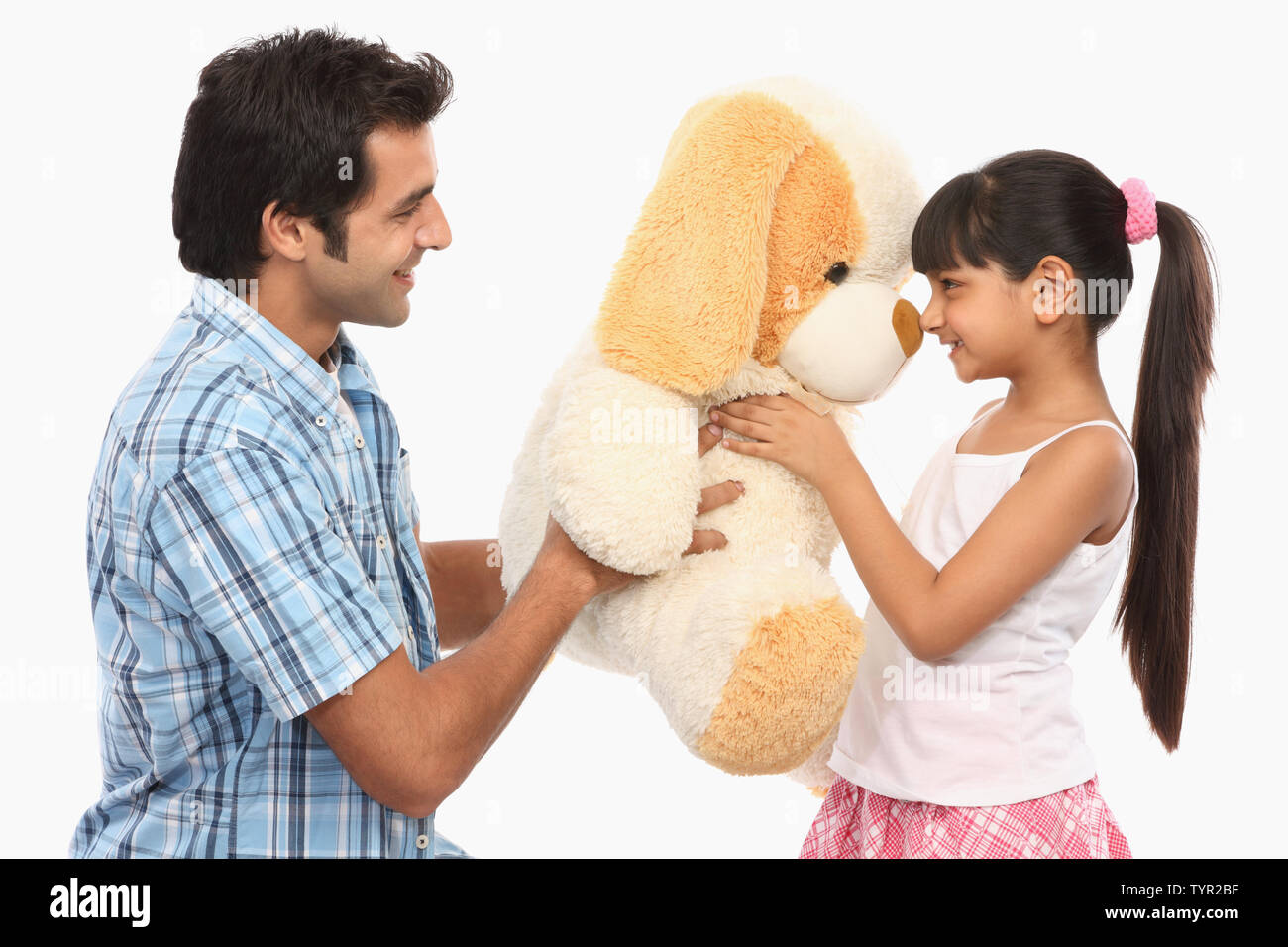 Man giving gift girl Cut Out Stock Images & Pictures - Alamy