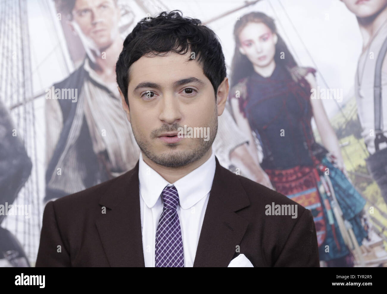 Jason Fuchs arrives on the red carpet for the premiere of 'Pan' at the ...