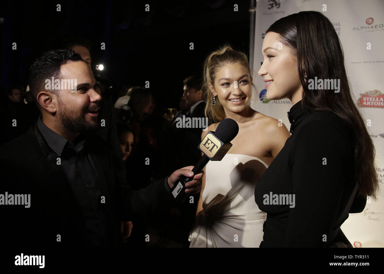Gigi and Bella Hadid arrive on the red carpet at the Global Lyme ...
