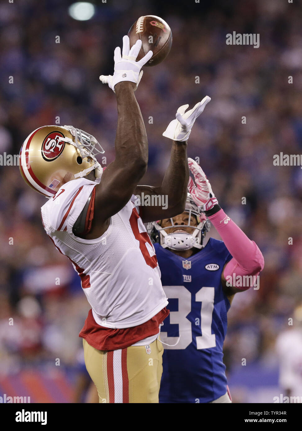 New York Giants Wade Trevin defends San Francisco 49ers Anquan Boldin ...