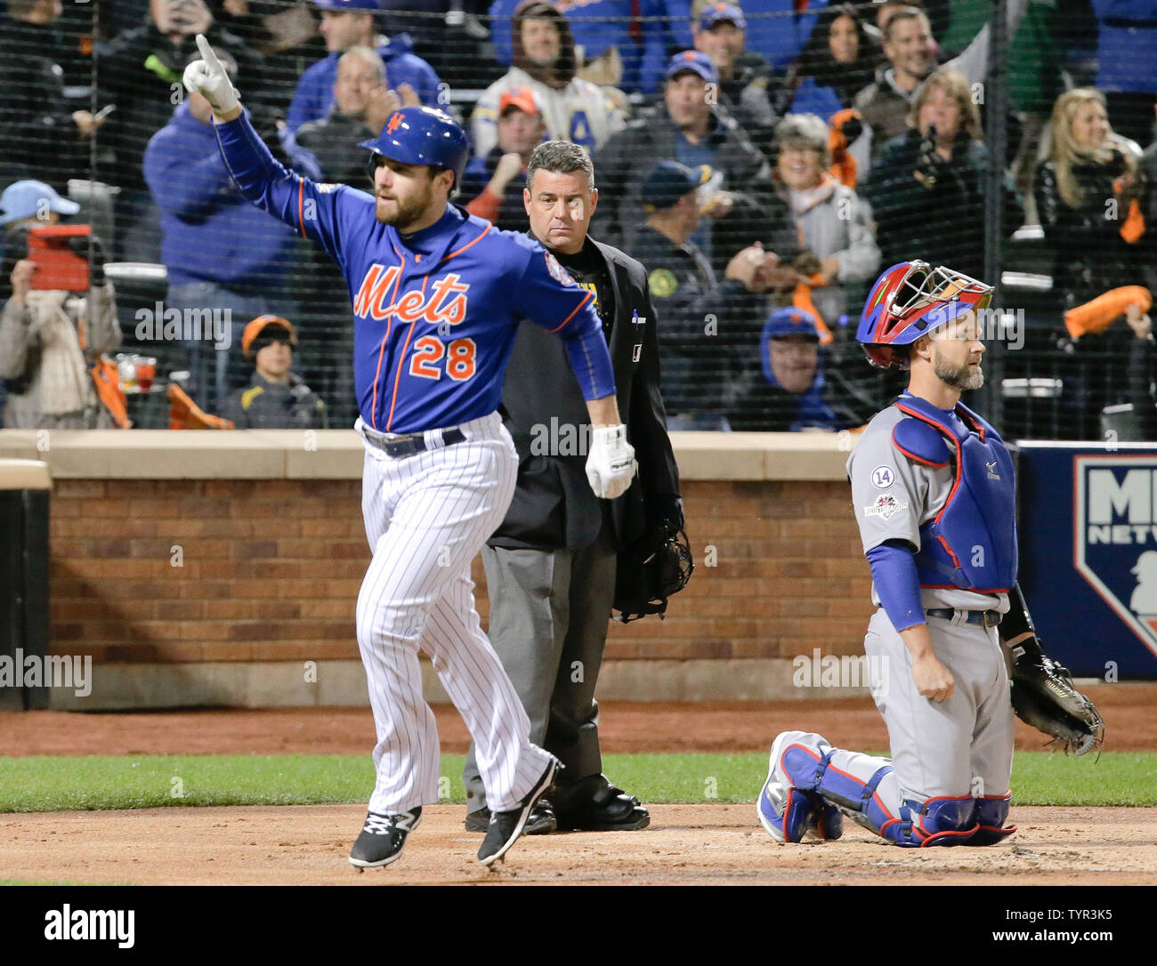 New York Mets batter Daniel Murphy (28) celebrates a solo home run as ...