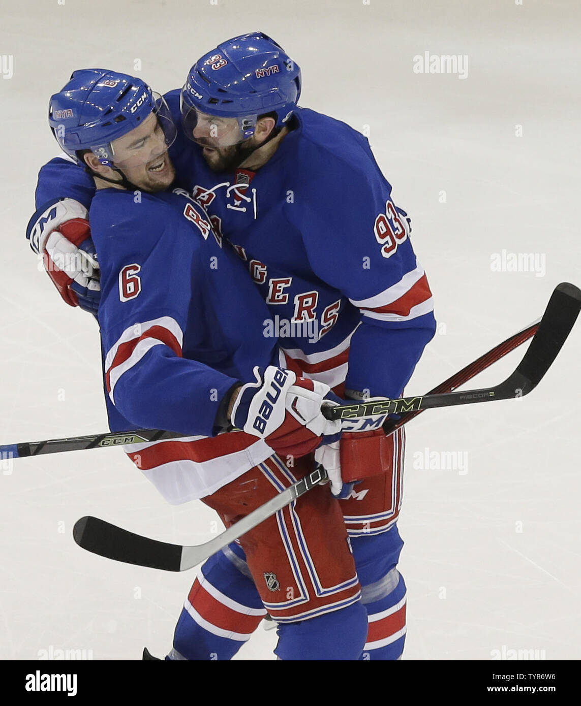 New York Rangers Dylan McIlrath celebrates with Keith Yandle after ...