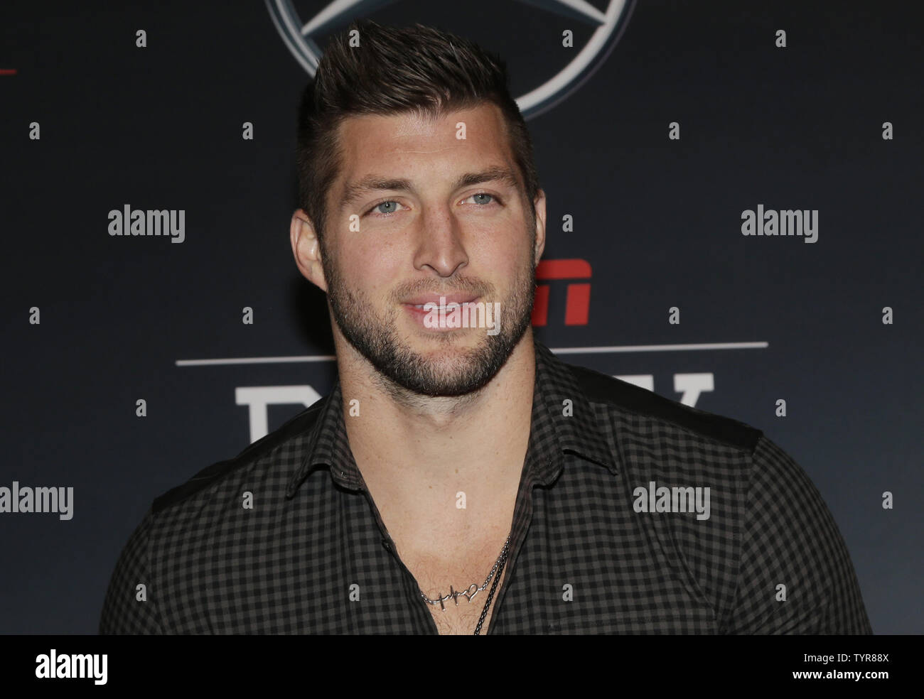 Tim Tebow arrives on the red carpet for ESPN The Party on February 5 ...