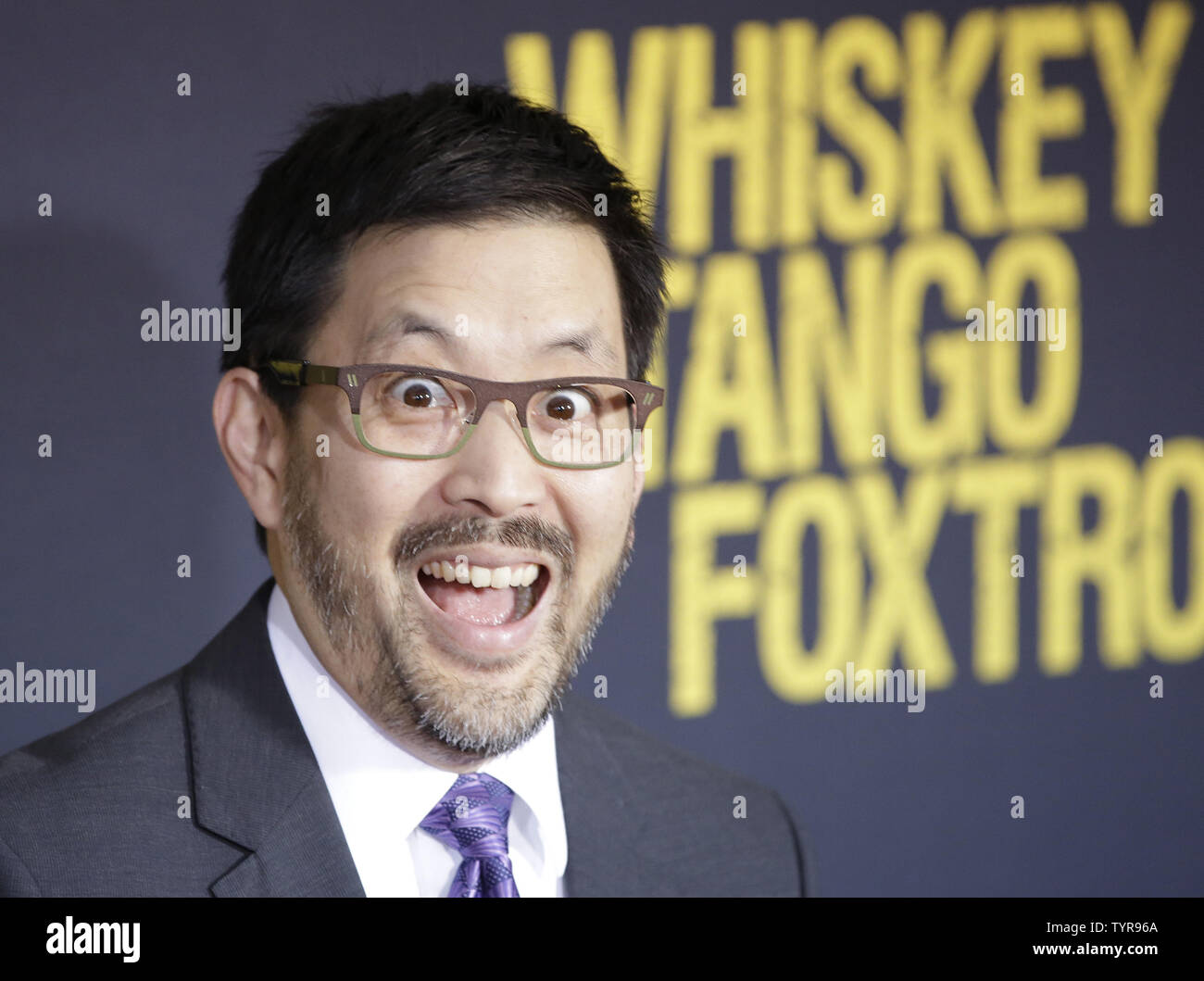 Scott Takeda arrives on the red carpet at the 'Whiskey Tango Foxtrot ...
