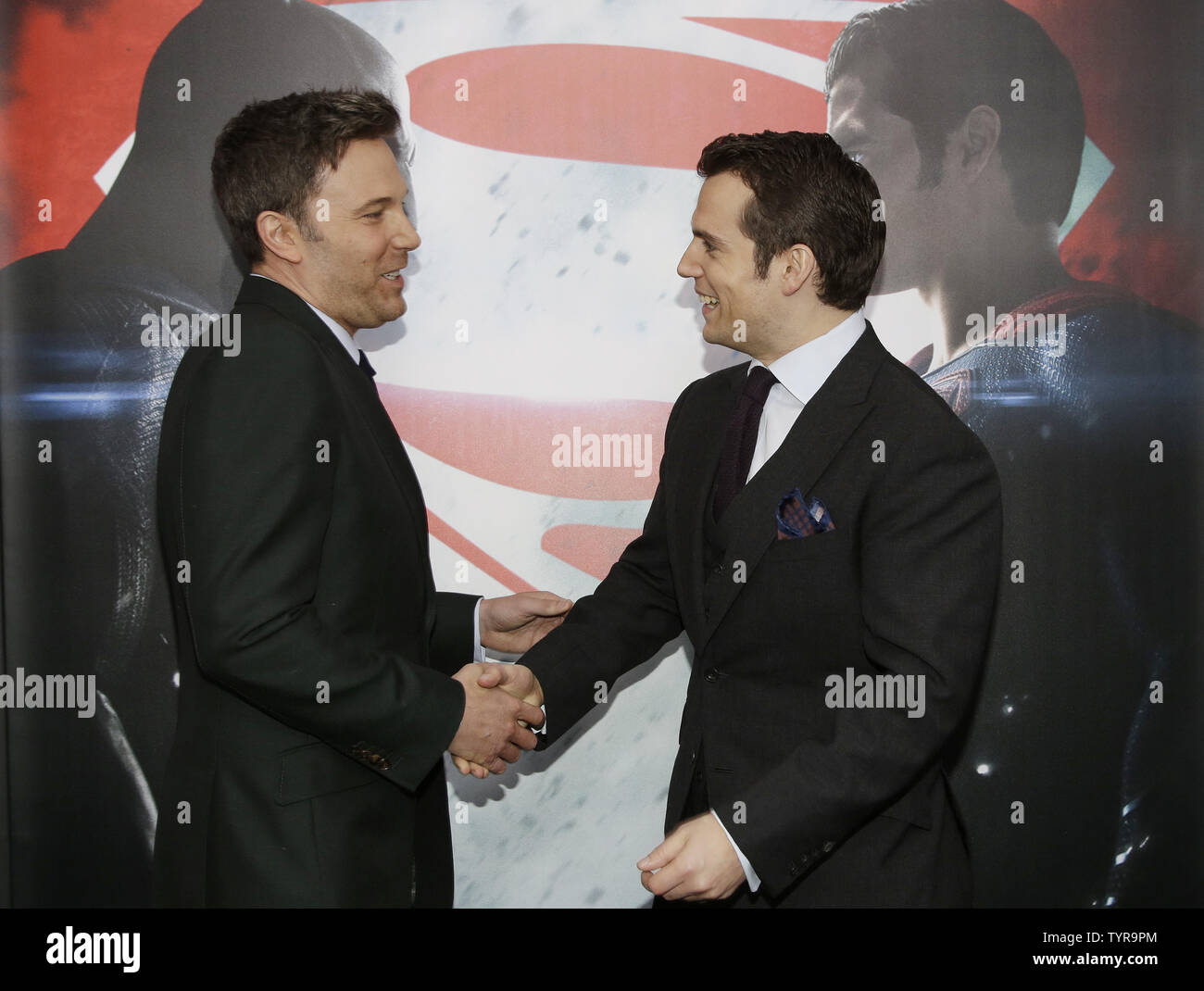 Ben Affleck and Henry Cavill arrive on the red carpet at the Batman V ...