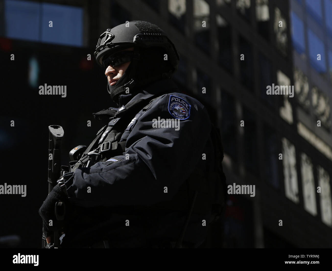 A police officer in the NYPD Counter terrorism division stands guard in ...