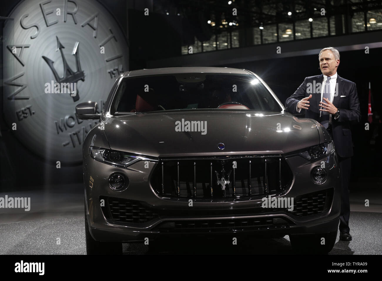 Maserati CEO Harald J. Wester unveils the 2017 Maserati Levante SUV at ...