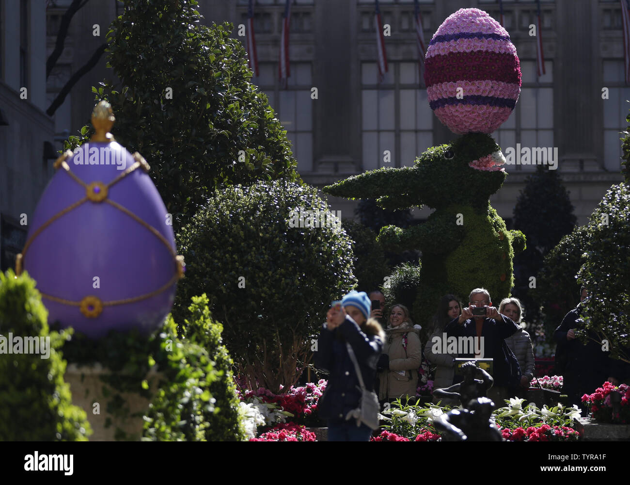 A 12-foot tall Easter bunny topiary made of moss and ivy and ...