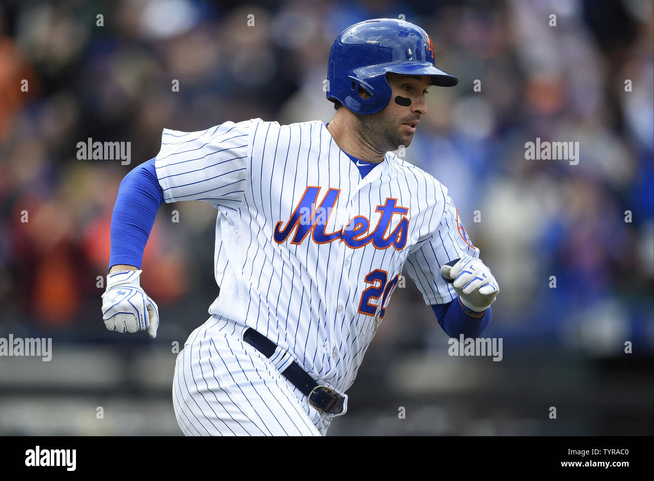 New York Mets second baseman Neil Walker (20) rounds first base after ...