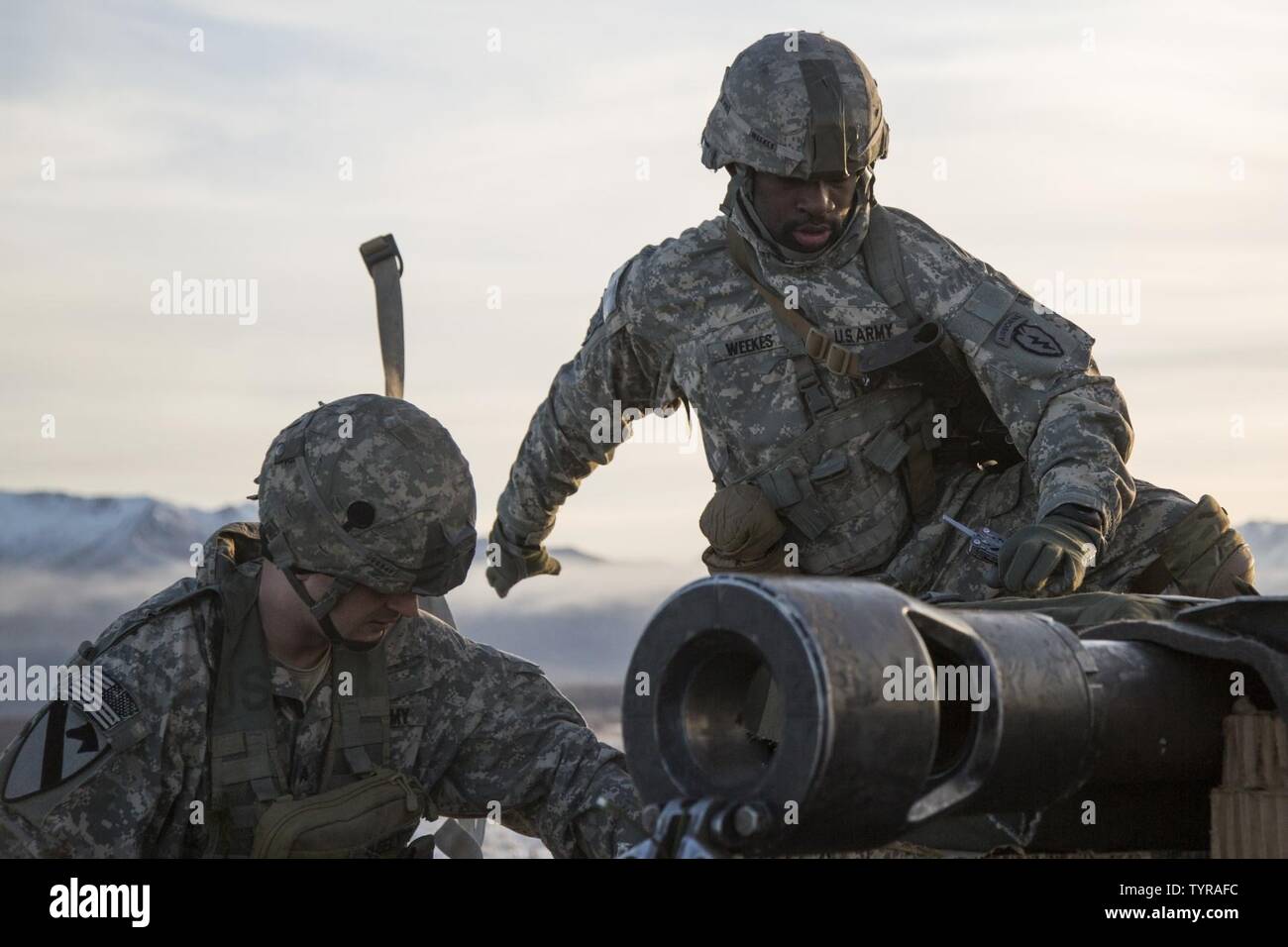 Paratroopers assigned to A Battery, 2nd Battalion, 377th Parachute Field Artillery Regiment, 4th ...