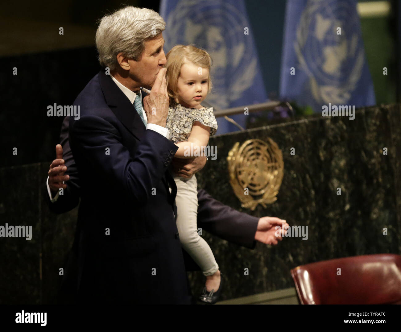 United States Secretary of State John Kerry enters holding ...