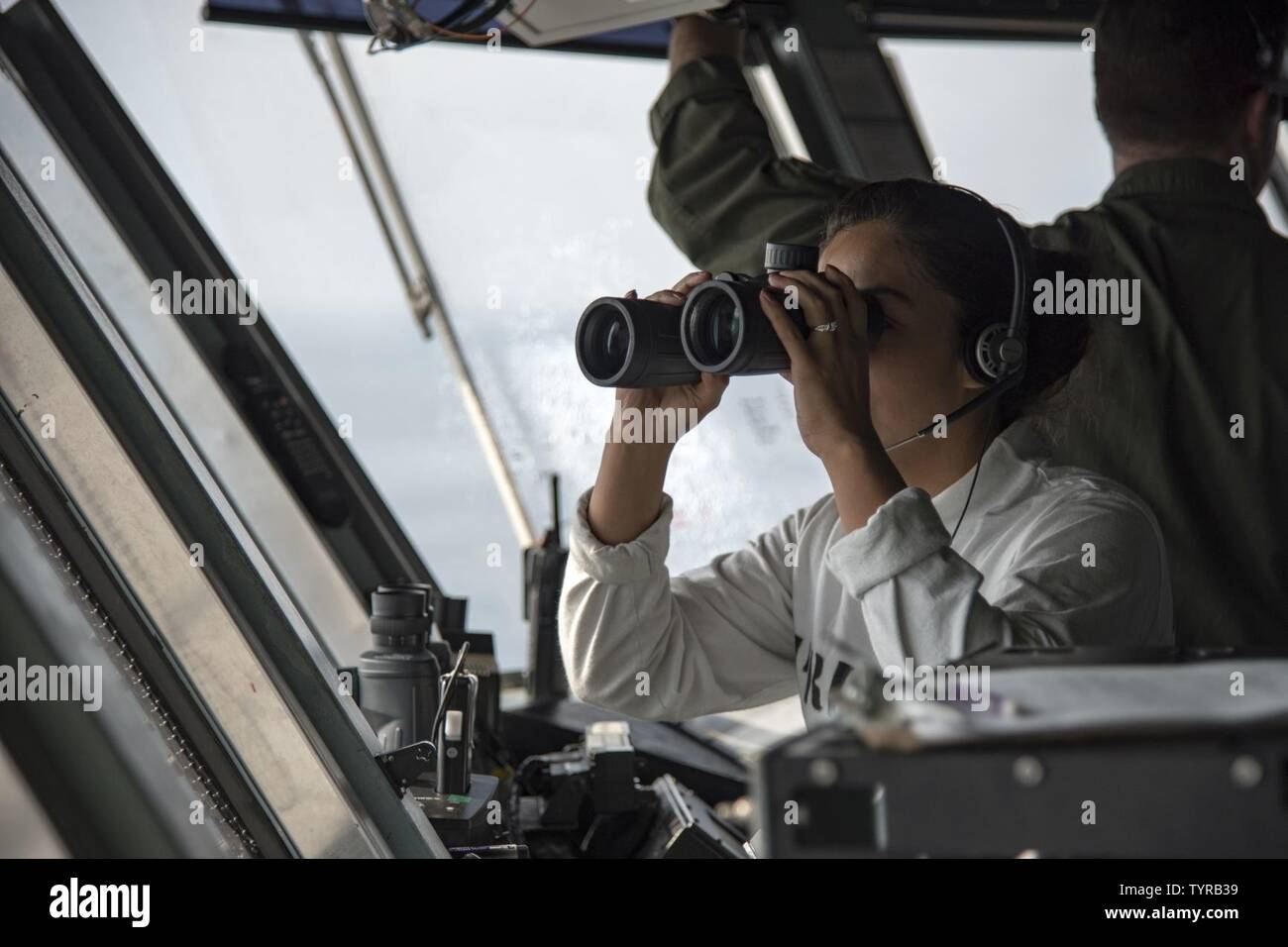GULF (Nov. 22, 2016) Seaman Genesis Cardenas observes flight operations ...