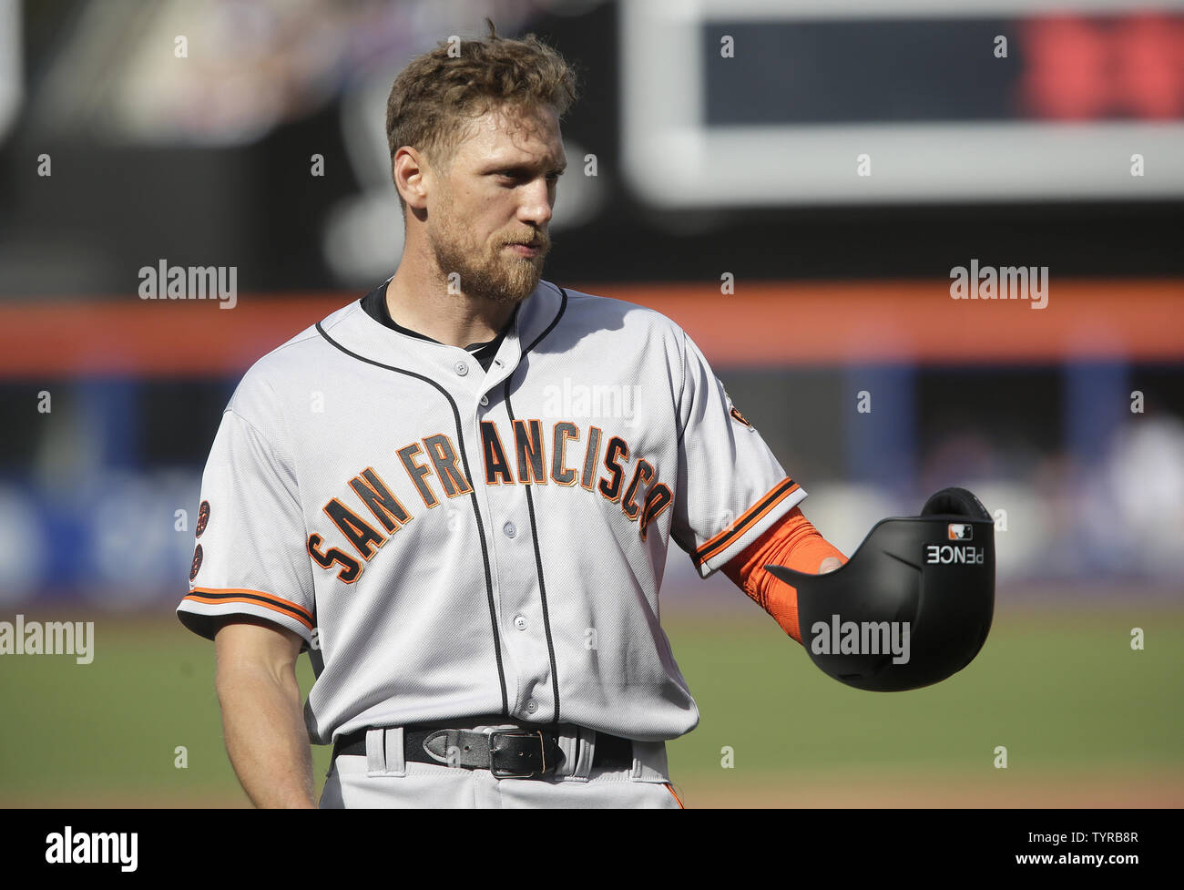 San Francisco Giants Hunter Pence takes off his helmet at the end of ...