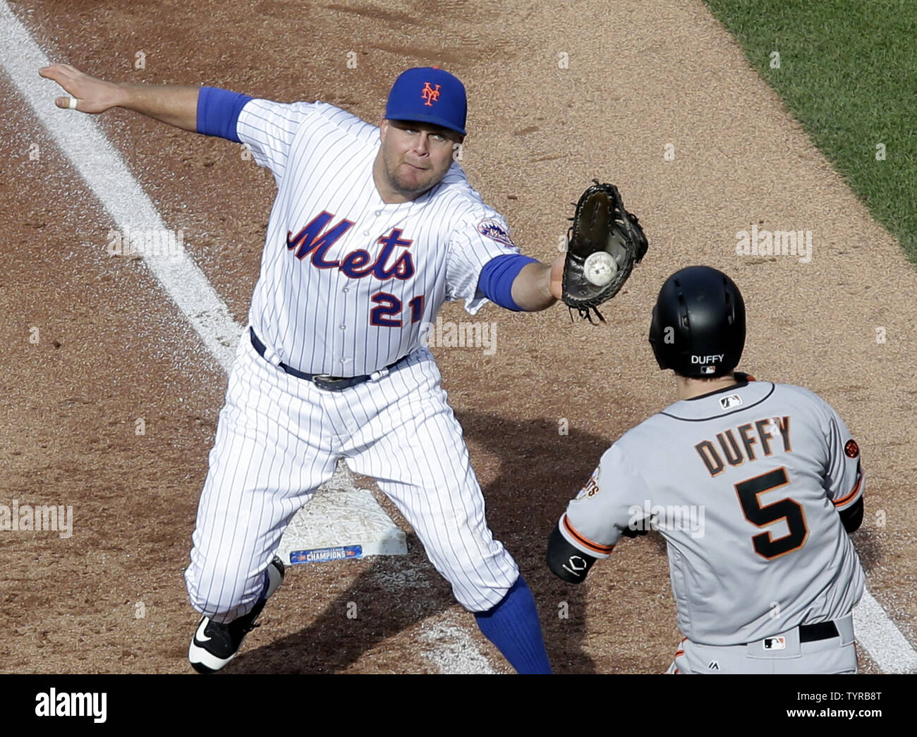 New York Mets Lucas Duda fails to make the play at first base because ...