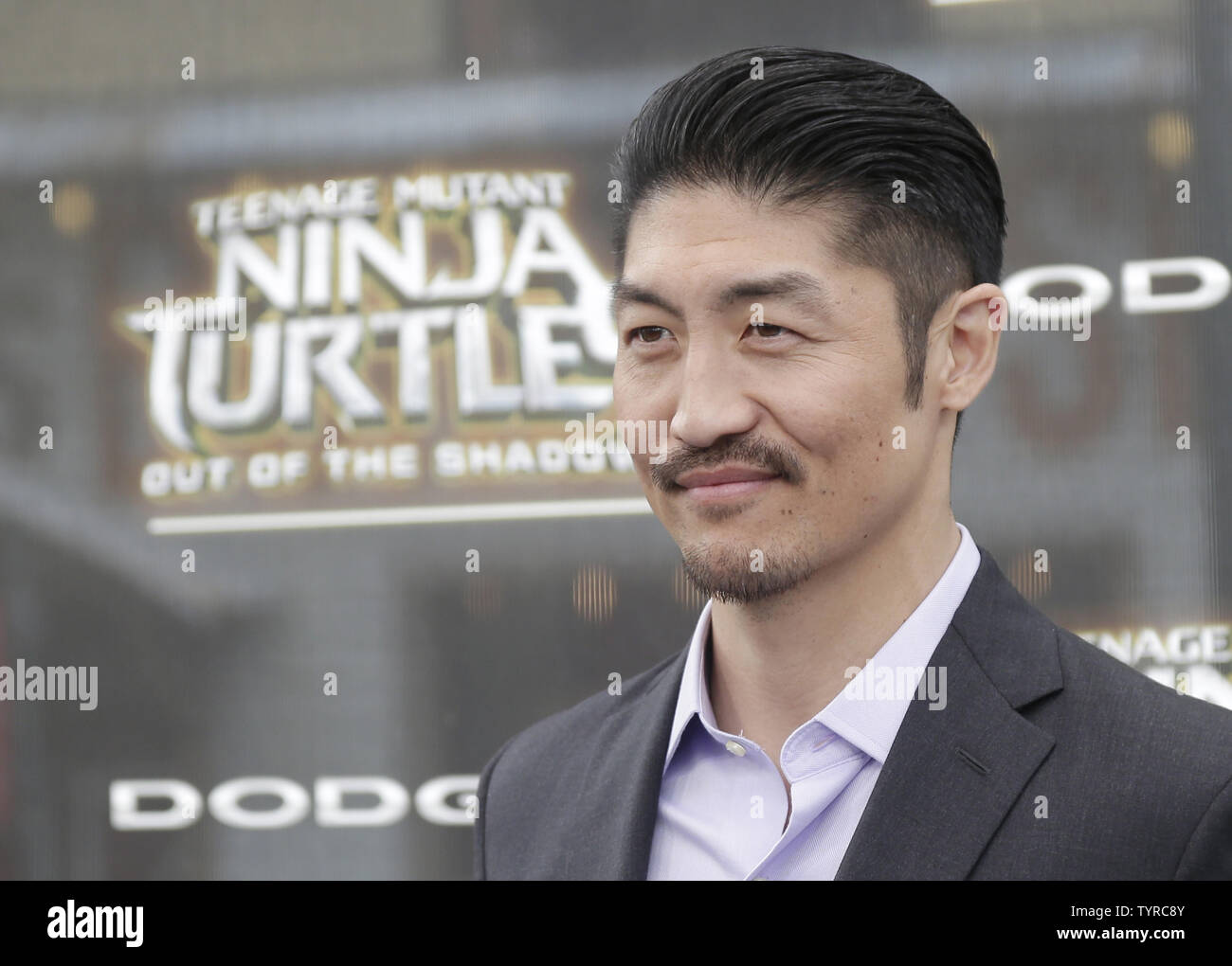 Brian Tee arrives on the red carpet at the Teenage Mutant Ninja Turtles ...
