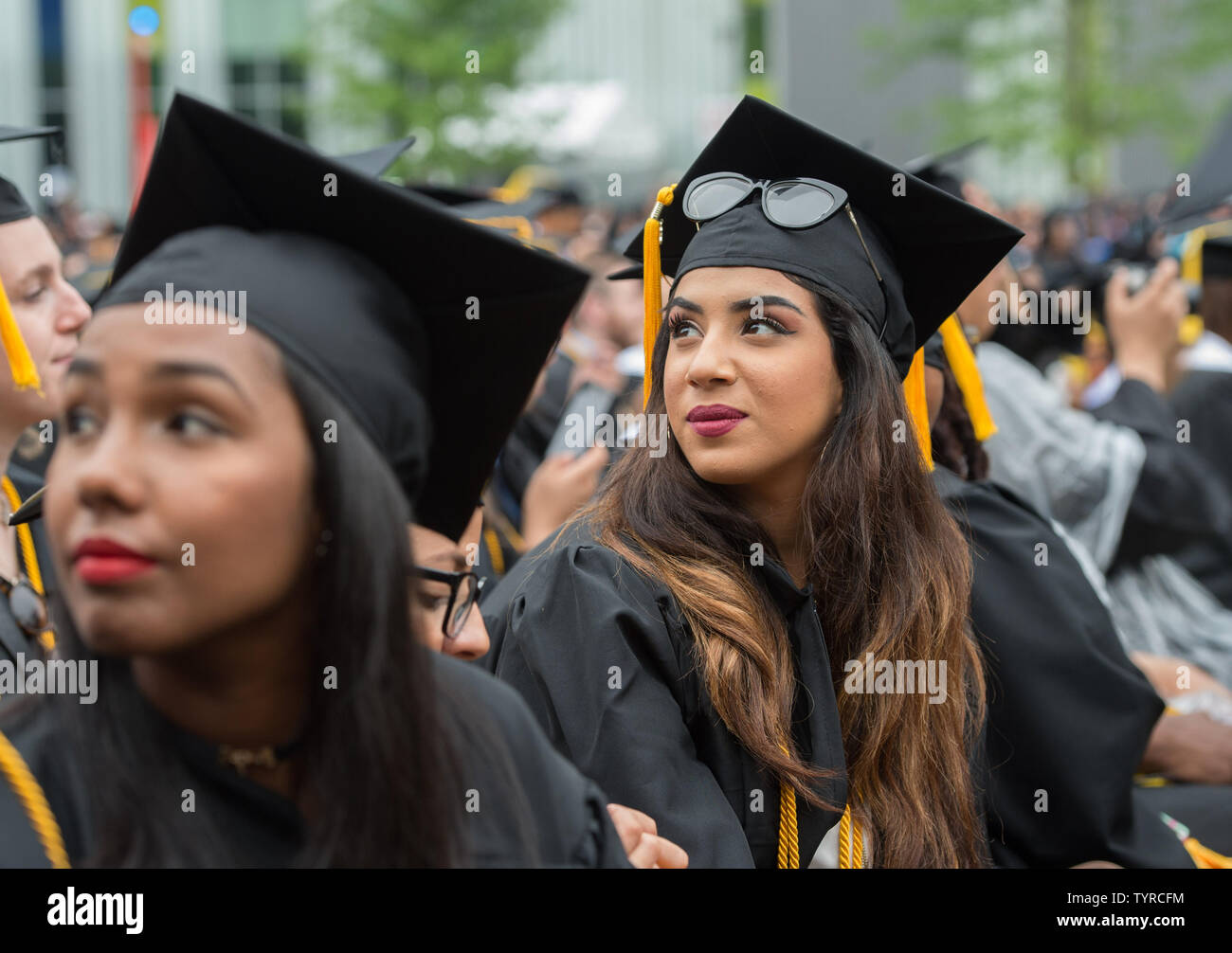 Students look on before First Lady Michelle Obama delivers her final ...