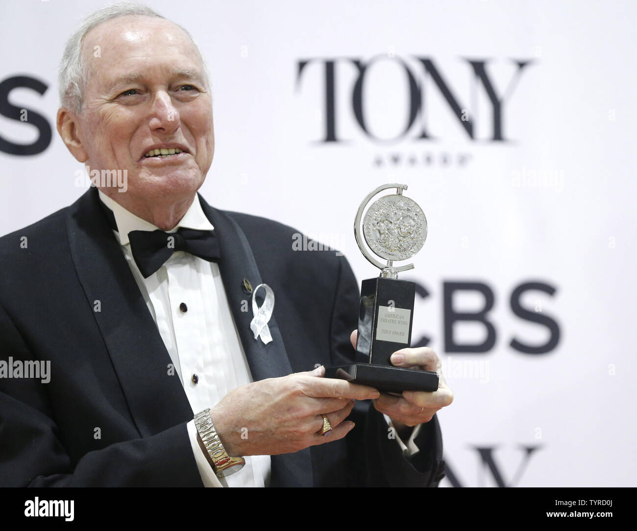 Marshall W. Mason arrives in the press room after winning a Tony Award ...