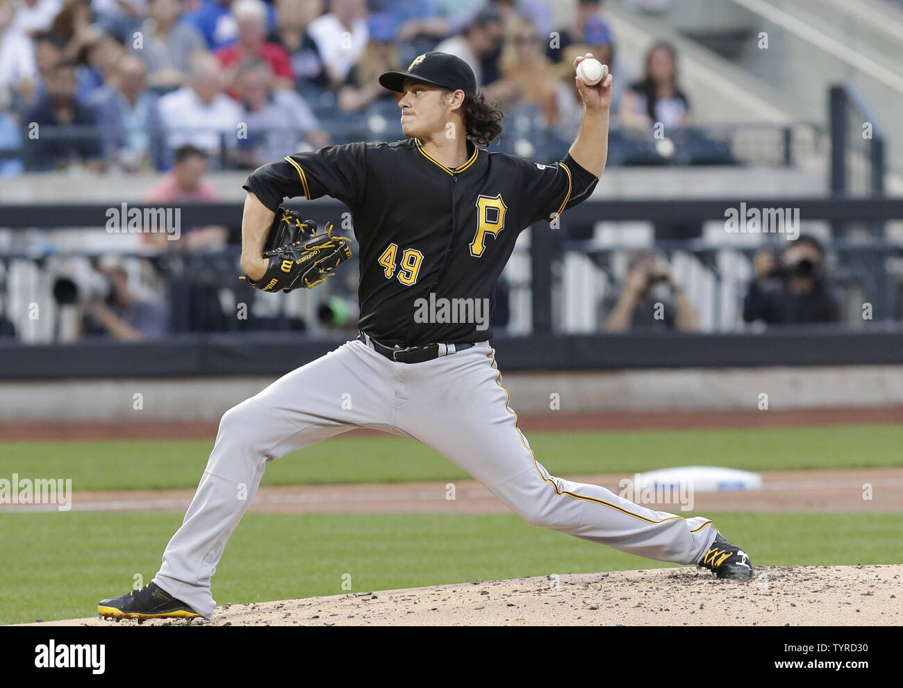 Pittsburgh Pirates starting pitcher Jeff Locke throws a pitch in the ...