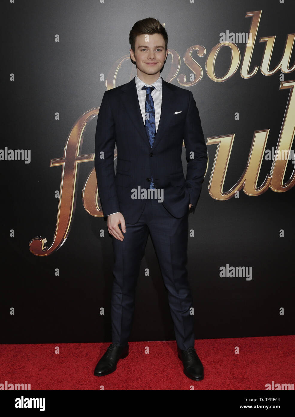 Chris Colfer arrives on the red carpet at the 'Absolutely Fabulous: The ...