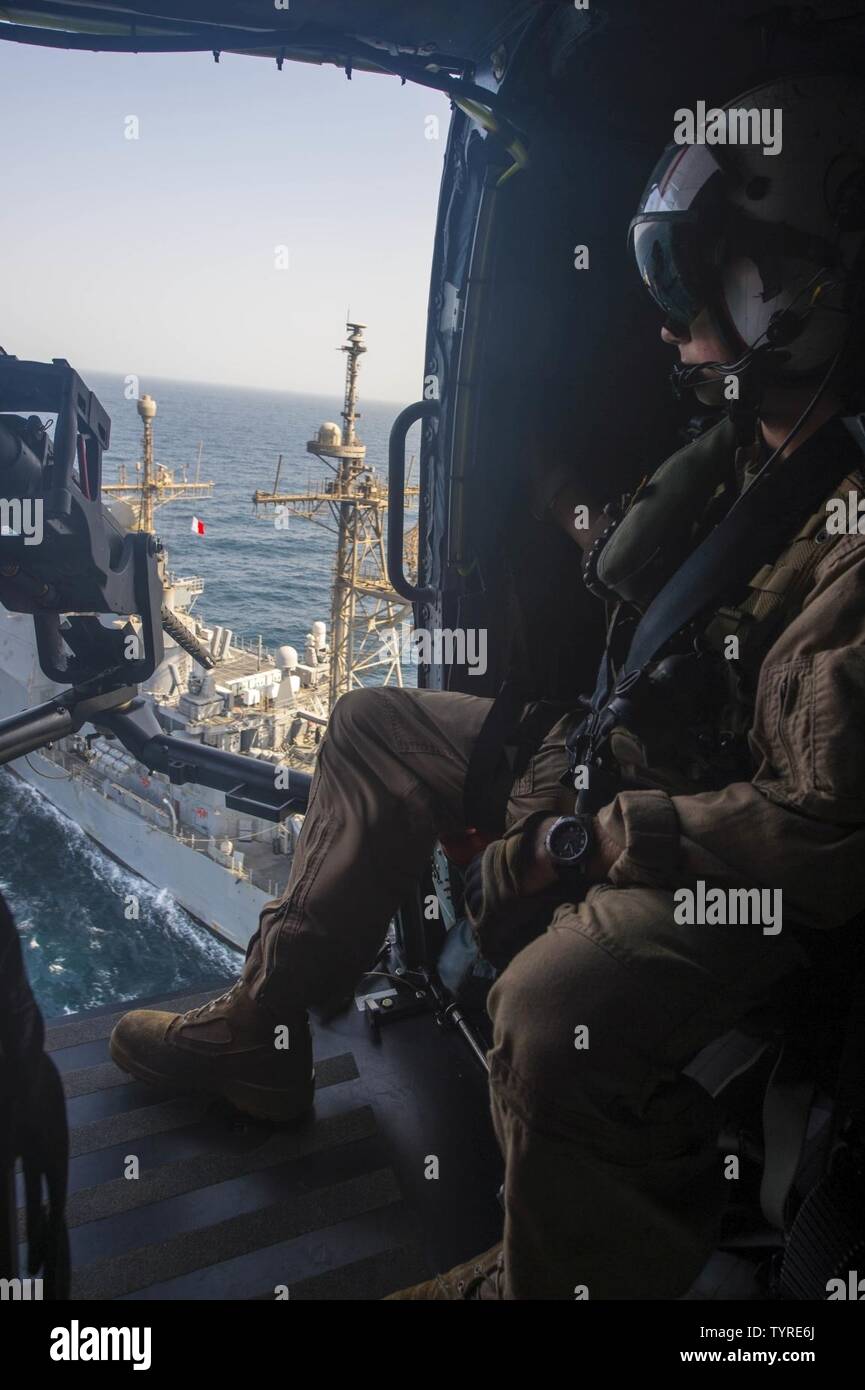 OF OMAN (Nov. 22, 2016) Petty Officer 3rd Class Ryan Stockman looks ...