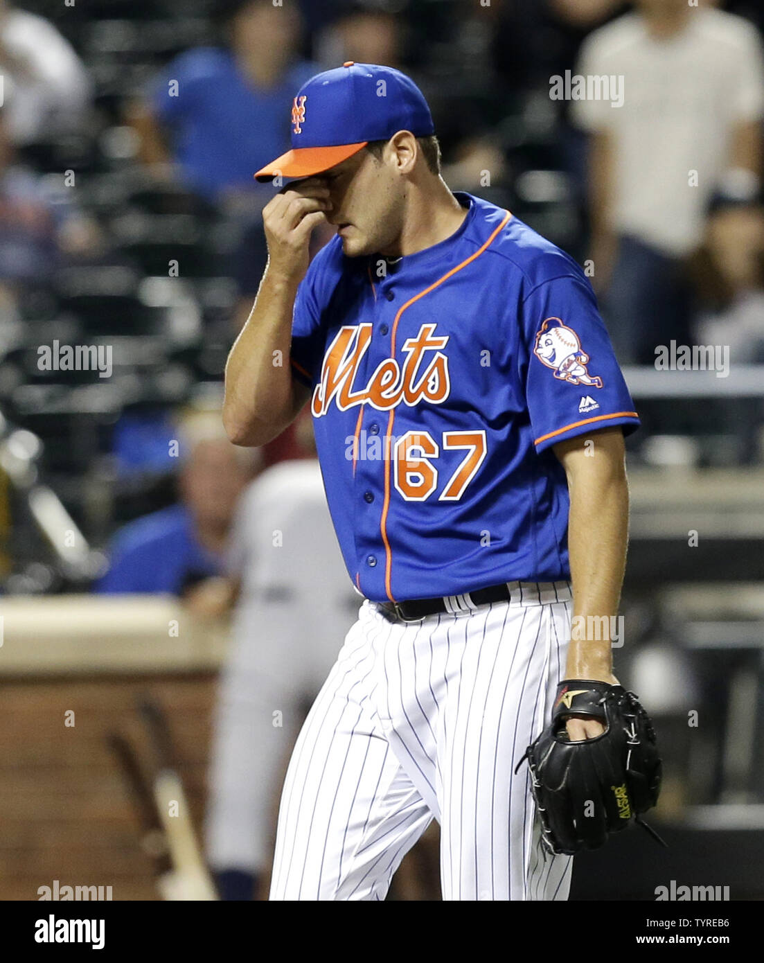 New York Mets Seth Lugo reacts after giving up a sac fly to New York ...