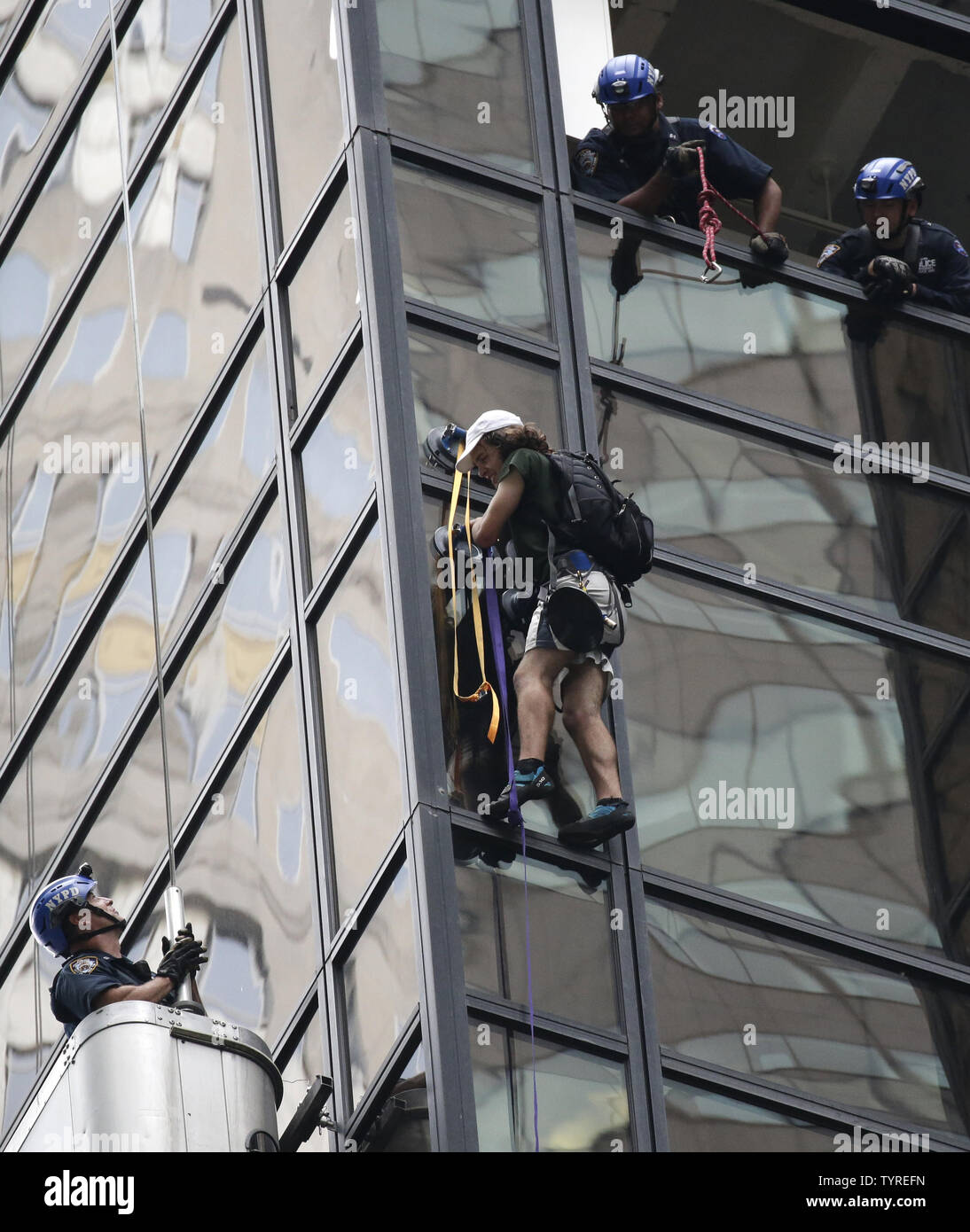 Man climbing out of window hi-res stock photography and images - Alamy
