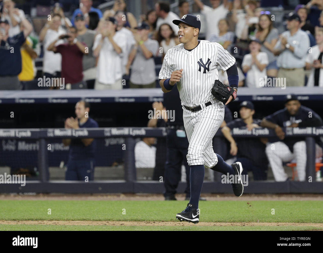 New York Yankees Alex Rodriguez jogs out of the dug out to play 3rd ...