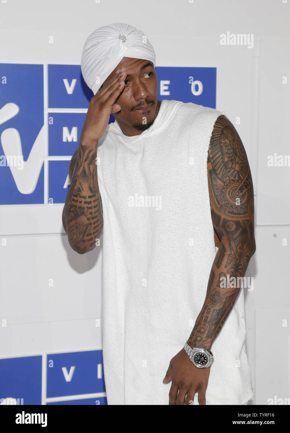 Nick Cannon arrives on the red carpet at the 2016 MTV Video Music ...