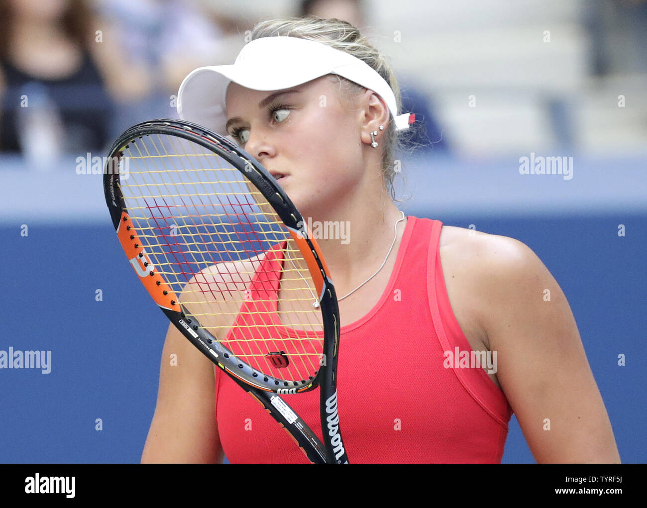 Kateryna Kozlova of the Ukraine reacts after losing a point in her ...