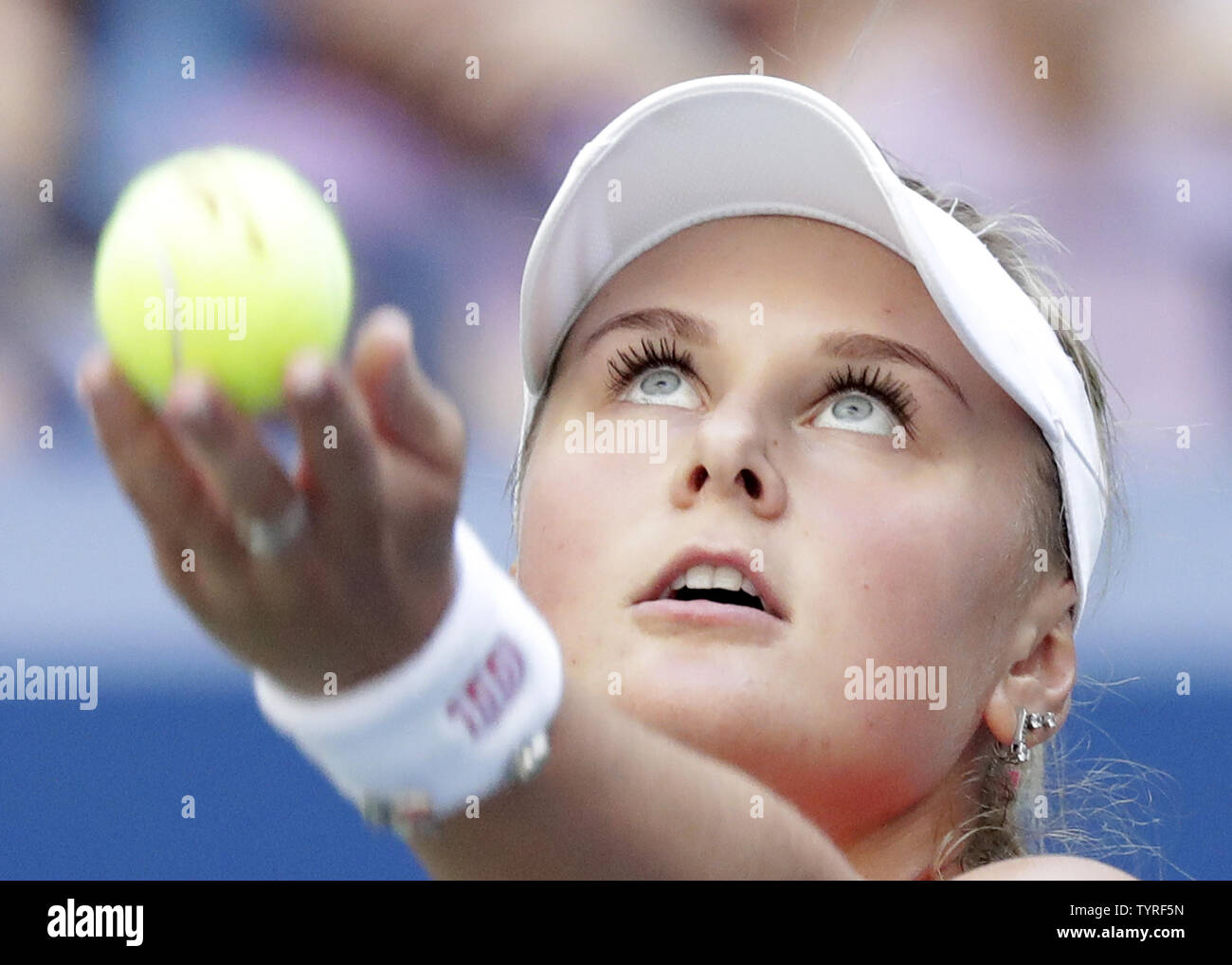 Kateryna Kozlova of the Ukraine serves in the first set in her first ...