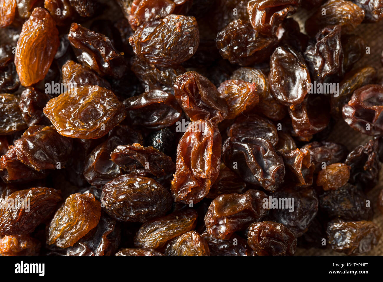 Organic Dried Brown Raisins in a Bowl Stock Photo - Alamy