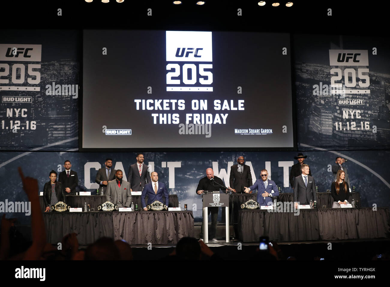 UFC president Dana White stands at the podium with the competitors at ...