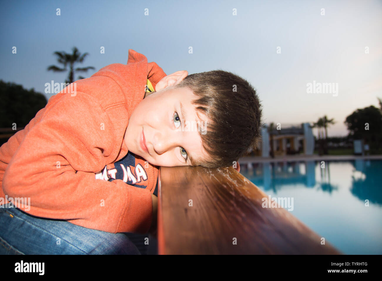 Boy on Bridge Stock Photo - Alamy