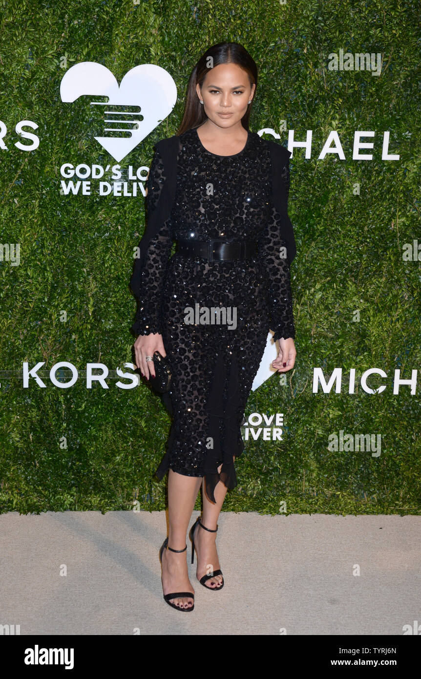 Chrissy Teigen arrives on the red carpet at the God's Love We Deliver ...