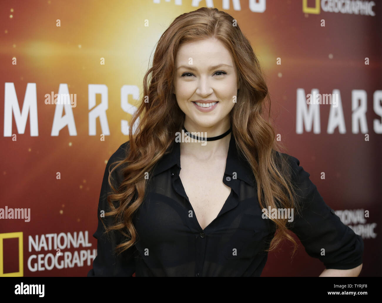 Maggie Geha arrives on the red carpet at the National Geographic ...