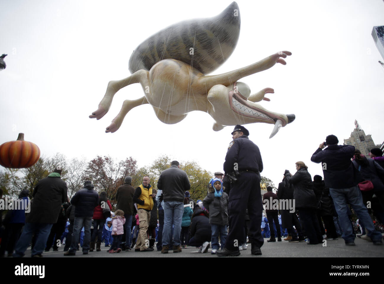 The Ice Age's Scrat & His Acorn balloon moves down the parade route at ...