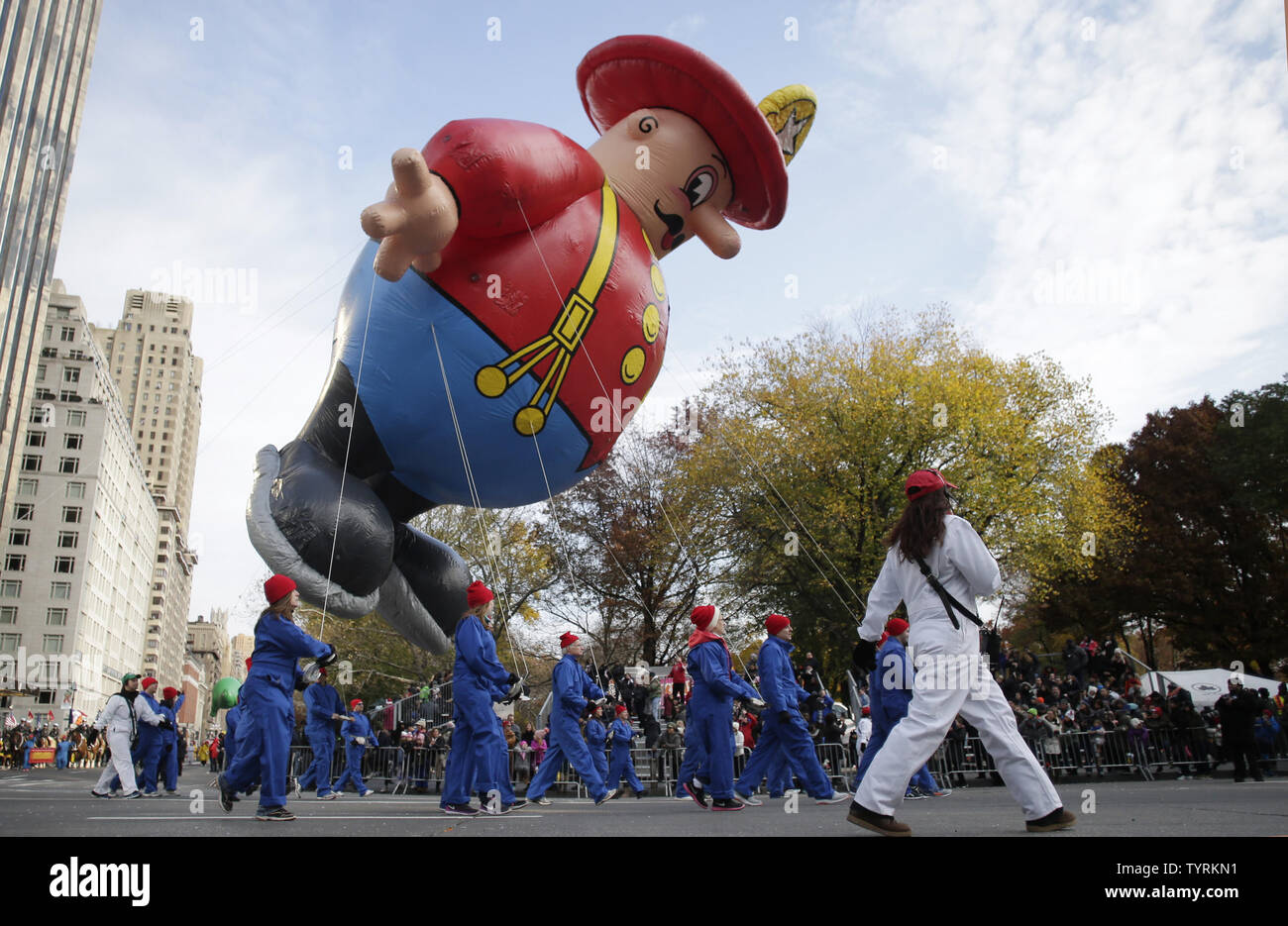 The Harold the Fireman balloon moves down the parade route at the 90th ...