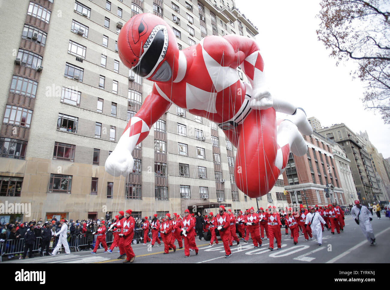 The Red Mighty Morphin Power Ranger balloon moves down the parade route ...
