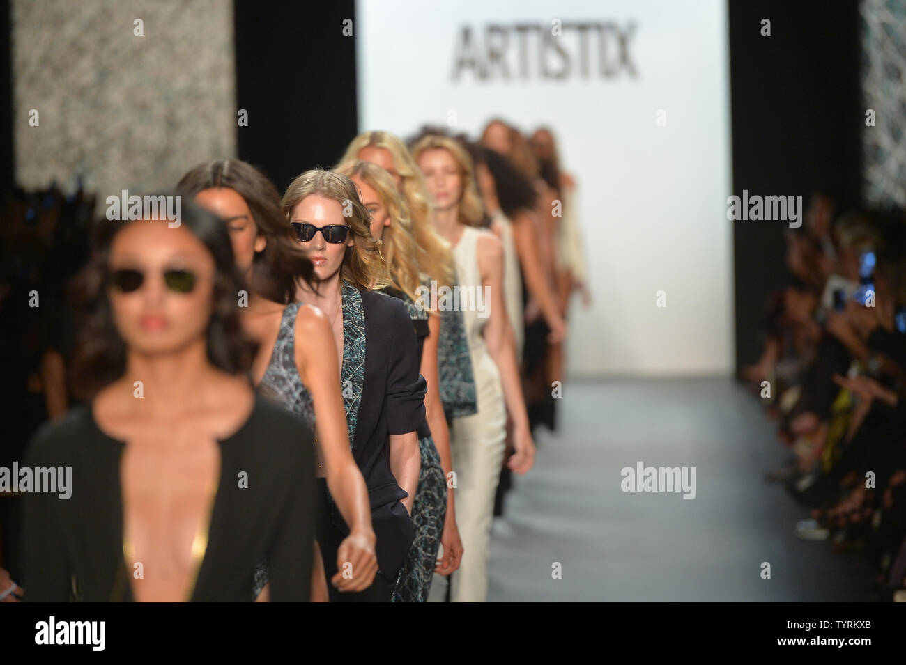 Models walk on the runway at the Artistix show during New York Fashion ...